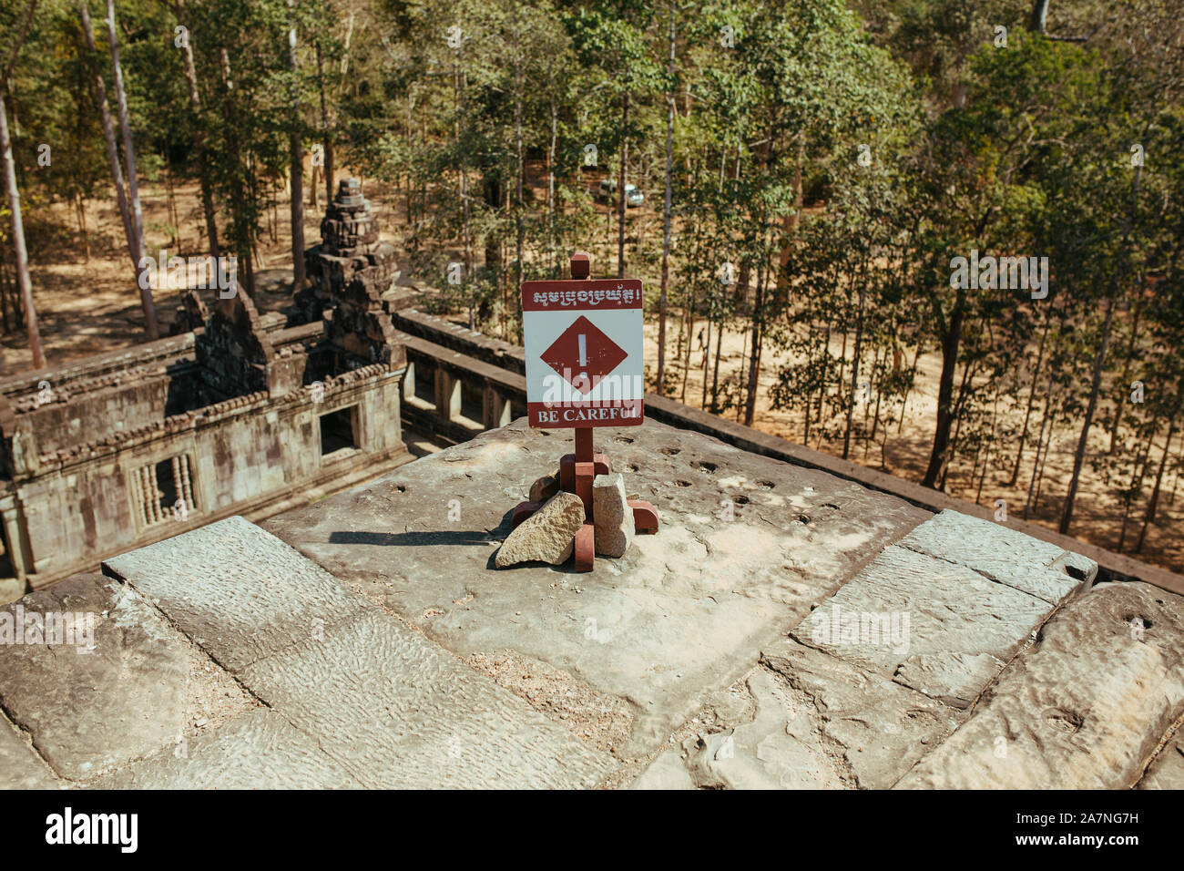 Be Careful Warning sign in Angkor Wat Temple Stock Photo - Alamy