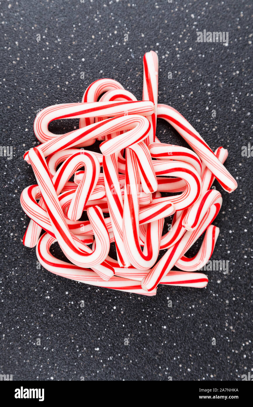 Red and white striped small peppermint flavored candy canes Stock Photo ...