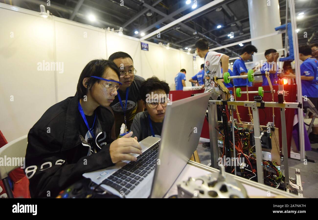 Participants test their robots before competition at the second ...