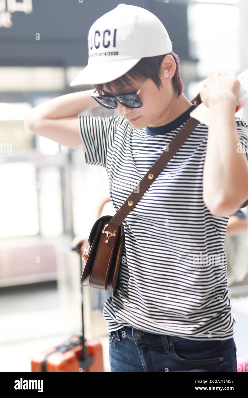 Chinese singer Chris Lee or Li Yuchun arrives at the Shanghai Hongqiao ...