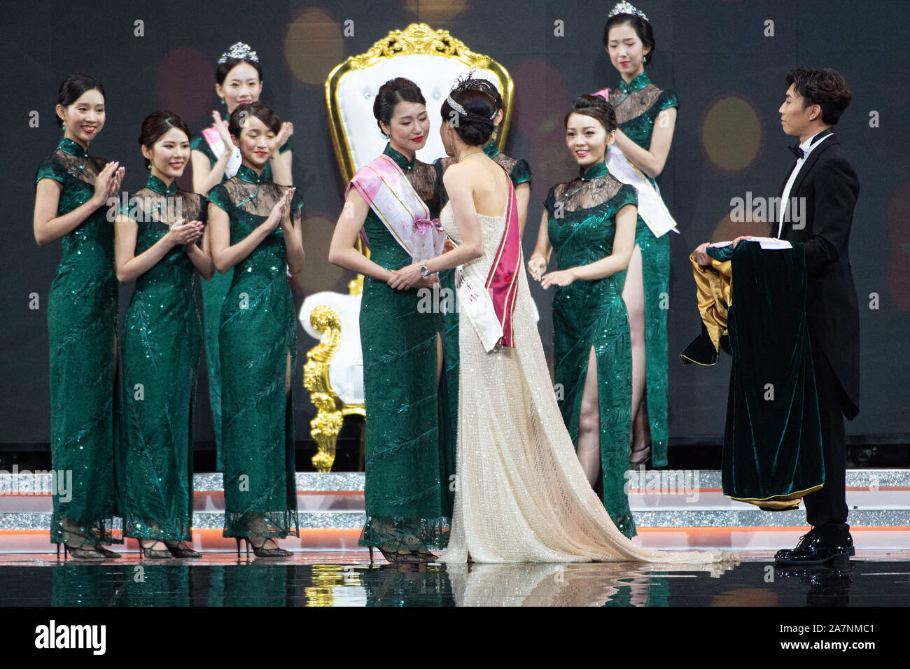 Contestants pose during the 2019 Miss Macau Pageant contest in Macau ...