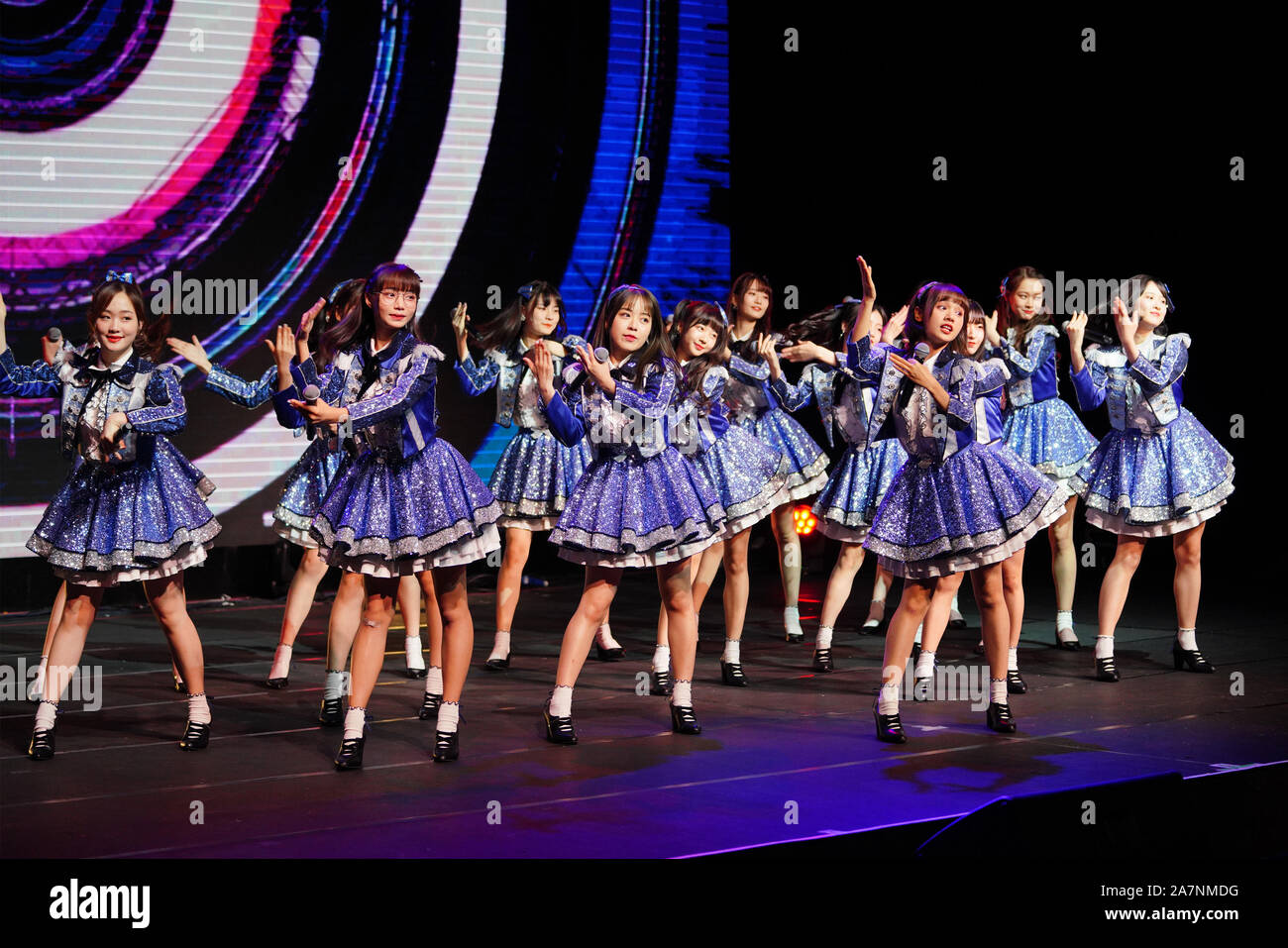 Members of Chinese idol girl group AKB48 Team SH, an official sister ...