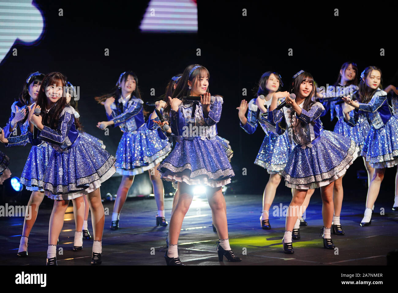Members of Chinese idol girl group AKB48 Team SH, an official sister ...