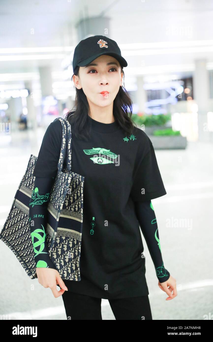 Chinese actress Wu Jiyan appears at an airport in Shanghai, China, 29 August 2019. Undershirt ...