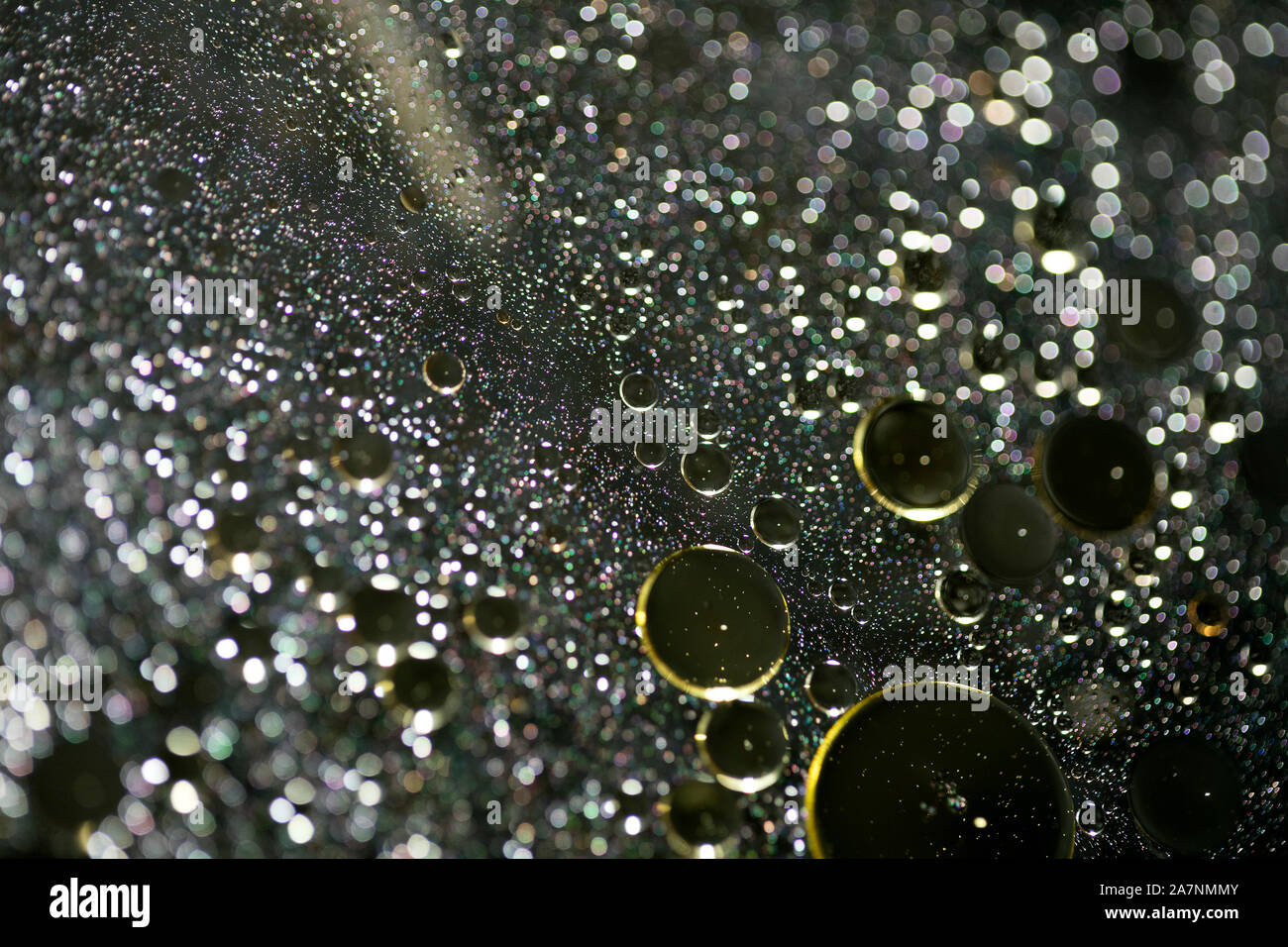 Oil bubbles on water macro background fifty megapixels high quality ...