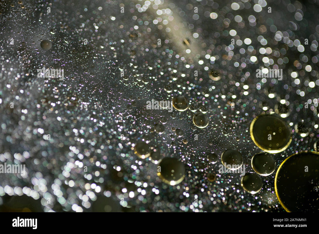 Oil bubbles on water macro background fifty megapixels high quality ...