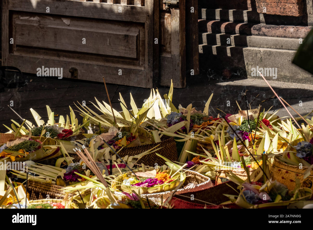 Hinu religious offerings to the gods sitting on the walls of the local ...