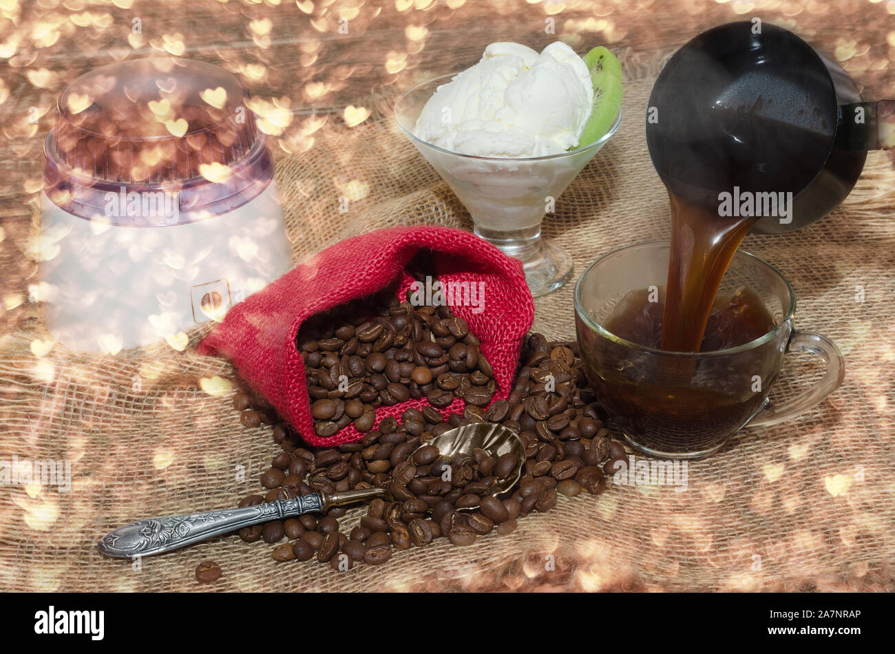 Hot coffee is poured into the Cup, steam rises Stock Photo - Alamy