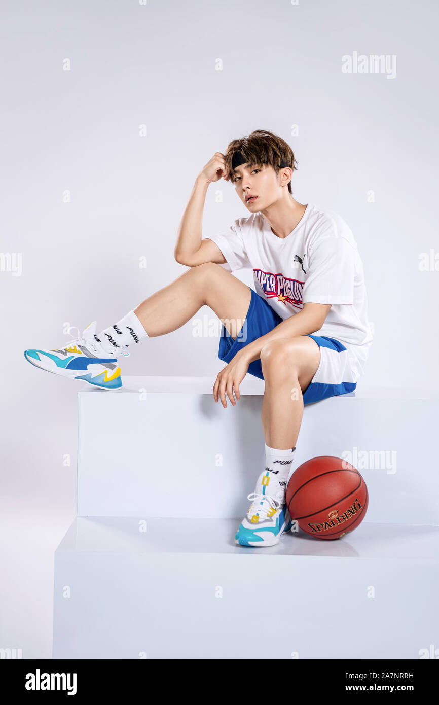 Taiwanese actor and singer Aaron Yan poses during the filming session ...