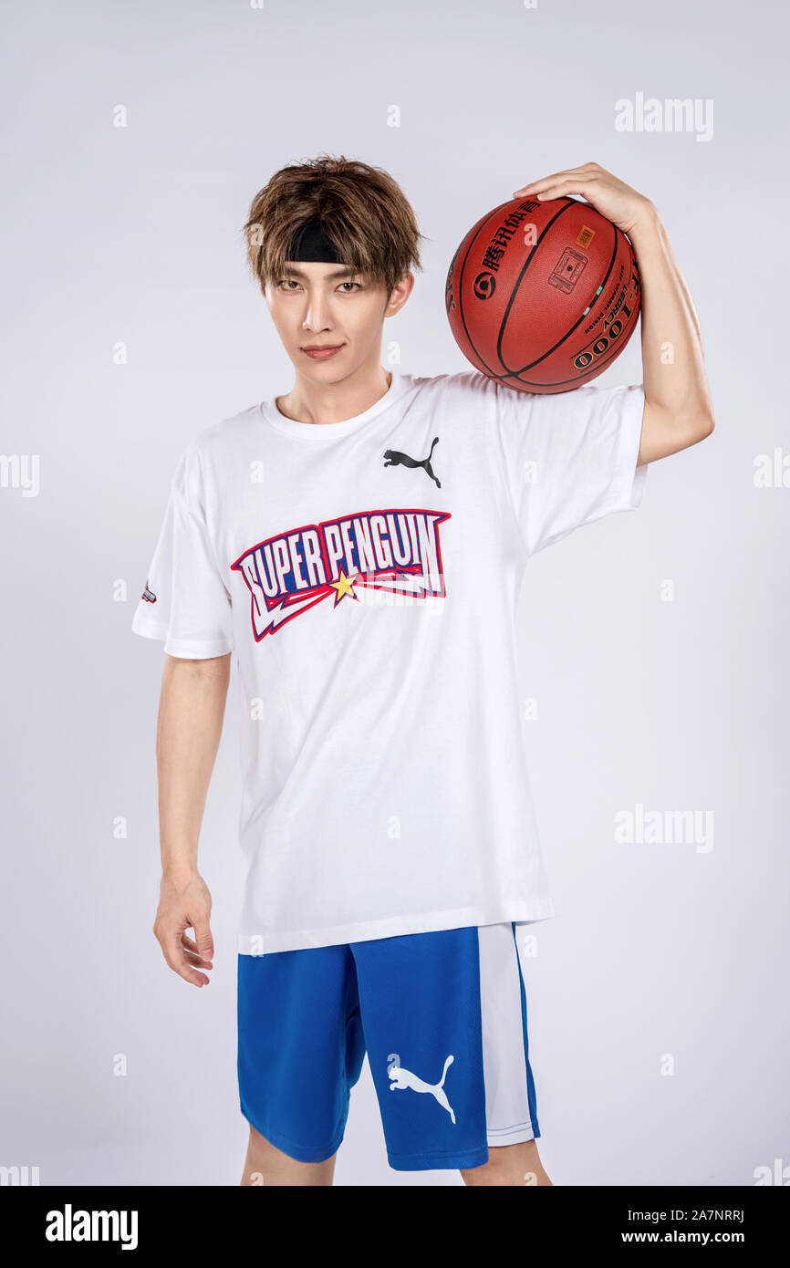 Taiwanese actor and singer Aaron Yan poses during the filming session ...