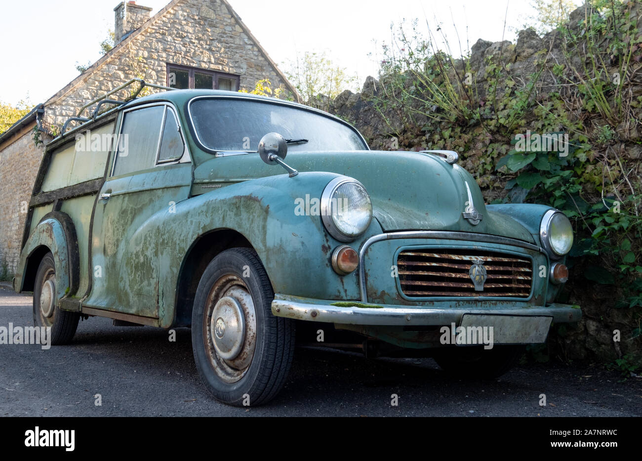 Vintage green Morris Minor 1000 model car, in poor condition with rust ...