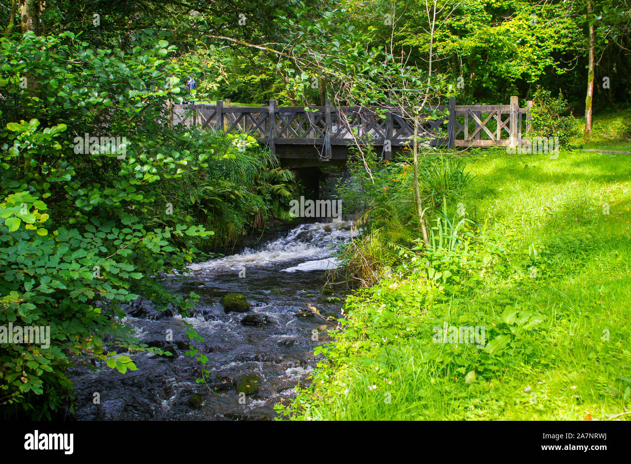 23 August 2019. The small bridge over the fast running river at the ...