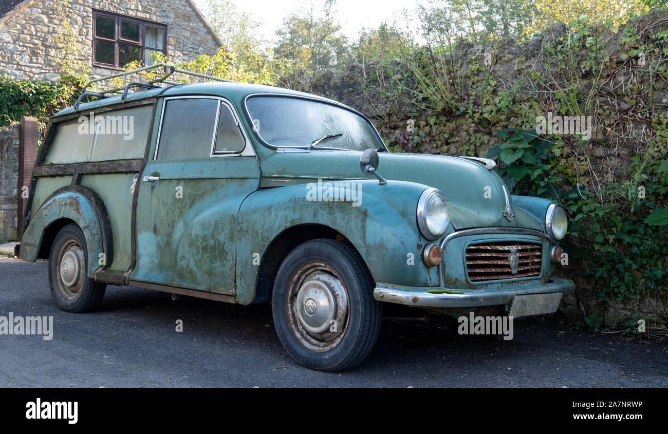 Side view of a vintage green Morris Minor 1000 car, a British design ...