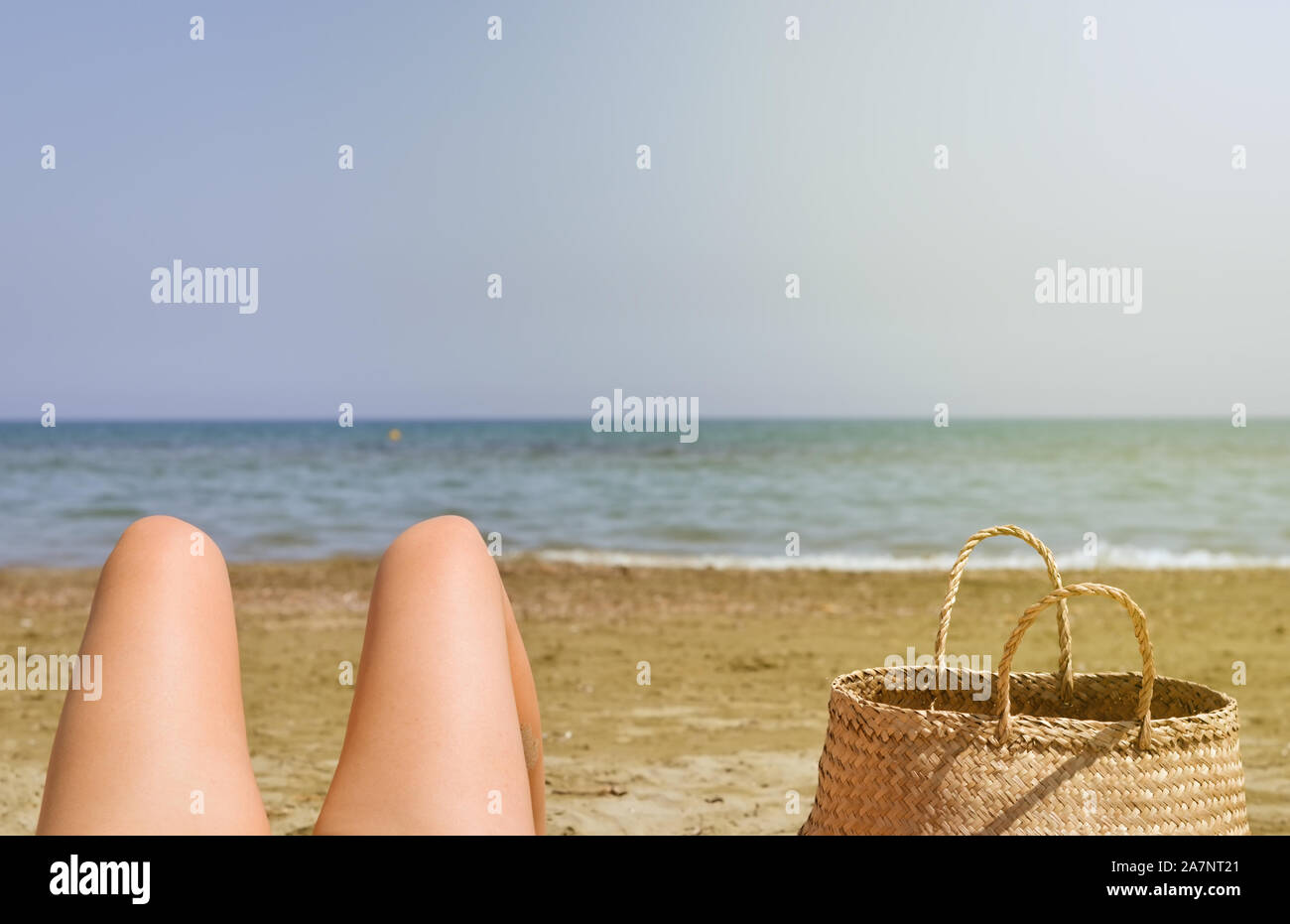 Beautiful tanned legs beach hi-res stock photography and images - Alamy