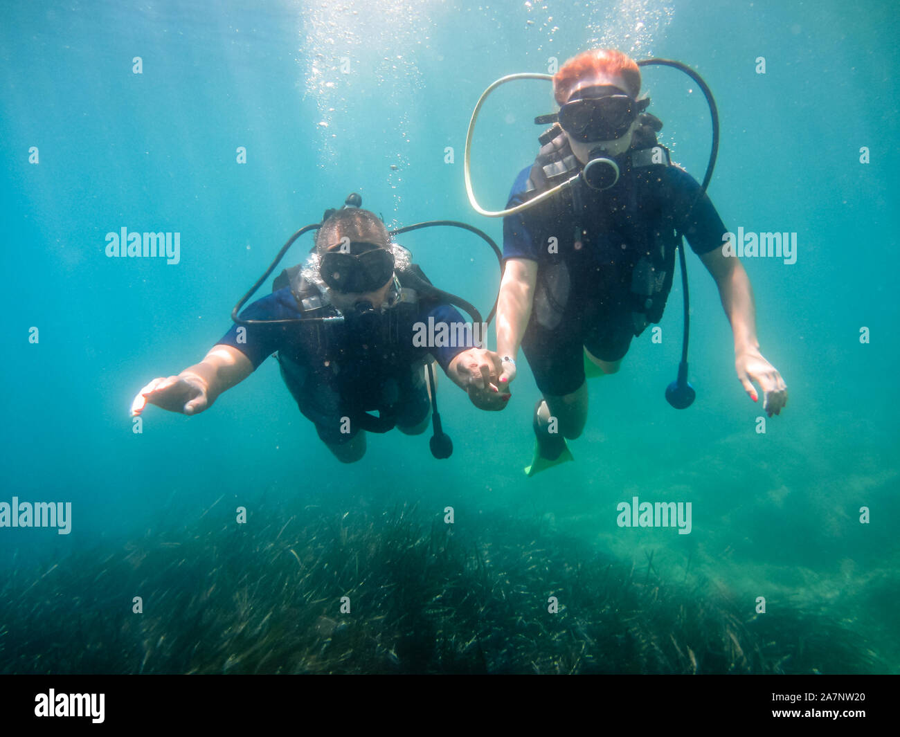 Young couple having scuba diving underwater in mediterranean sea Stock ...