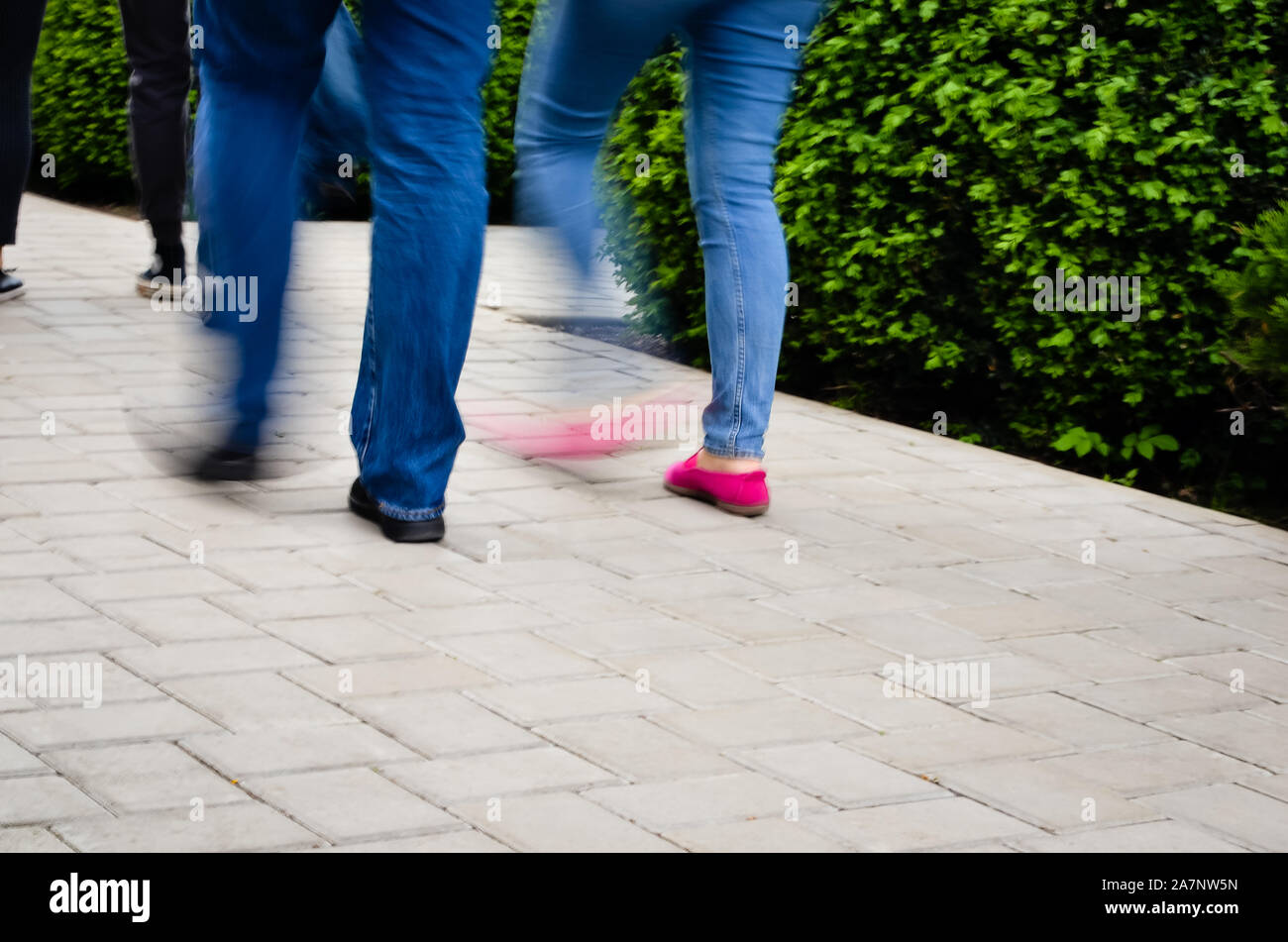 People walking on street - Motion Blur effect Stock Photo - Alamy