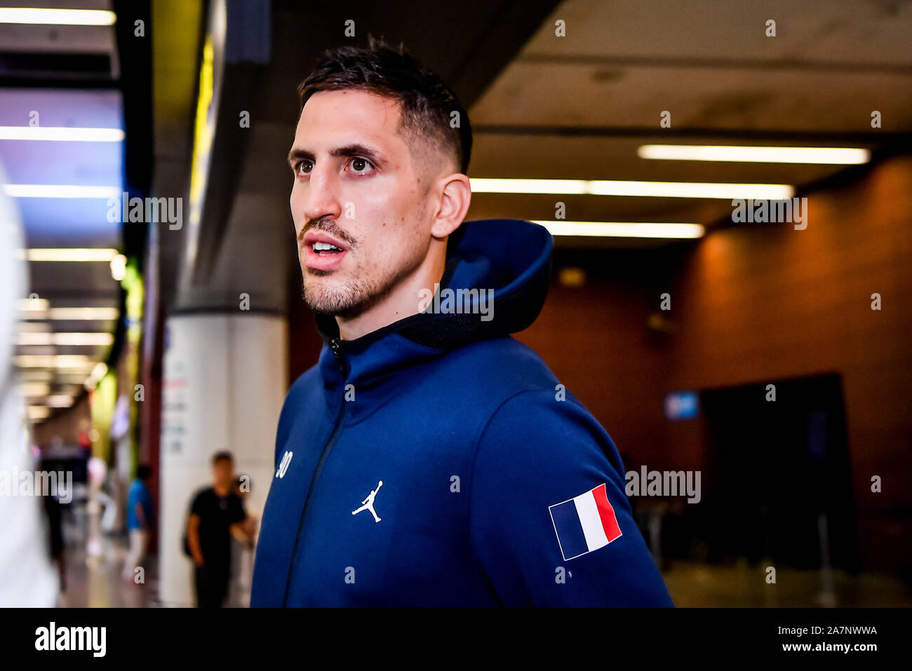 A player of France national basketball team arrives at the Shenyang ...