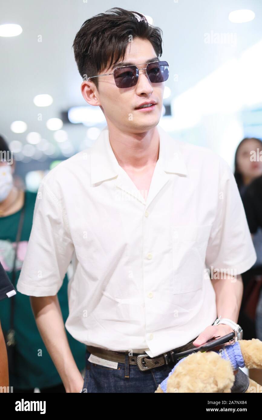 Chinese actor and singer Zhang Han or Hans Zhang arrives at an airport ...