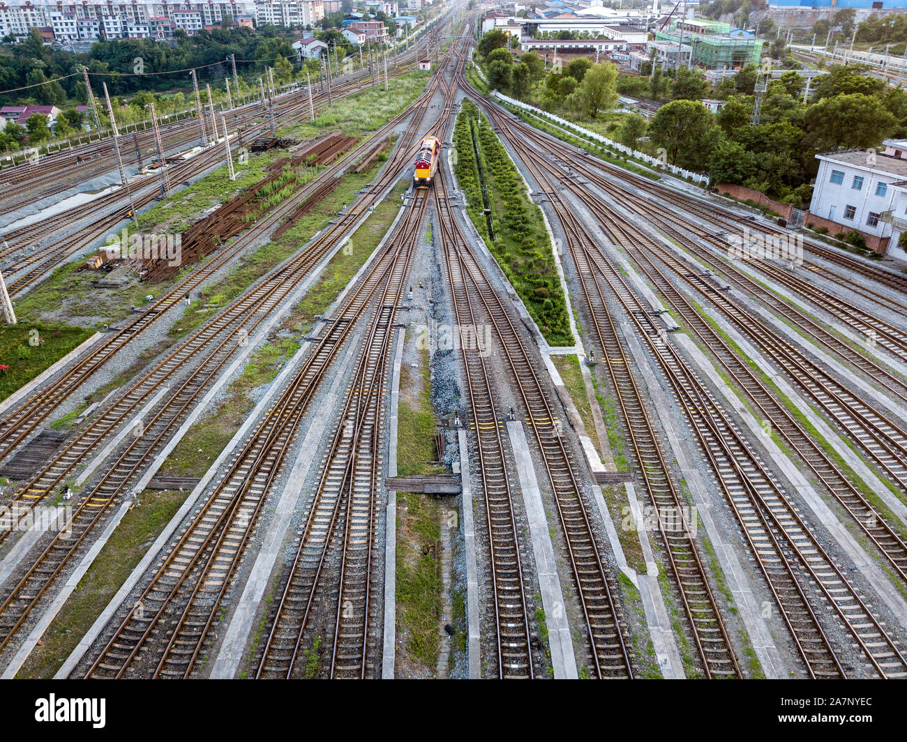 An aerial view of railway trains parked at a classification yard or ...