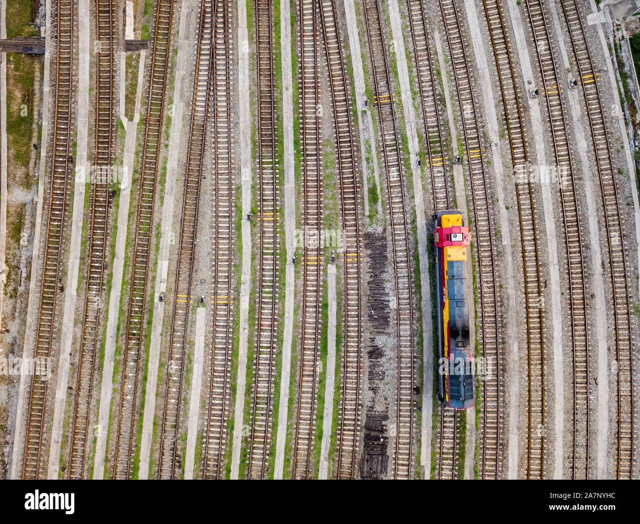 An aerial view of railway trains parked at a classification yard or ...
