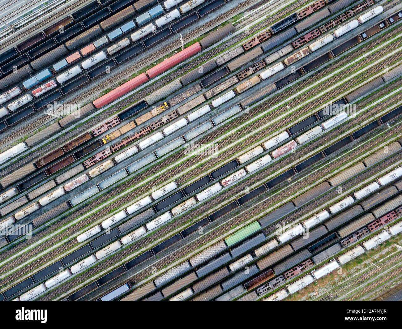 An aerial view of railway trains parked at a classification yard or ...