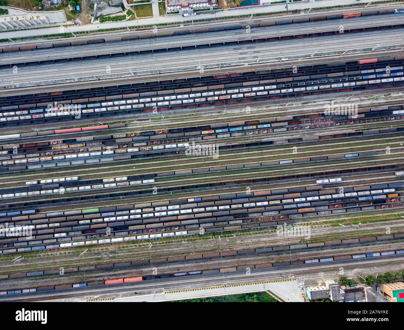 An aerial view of railway trains parked at a classification yard or ...