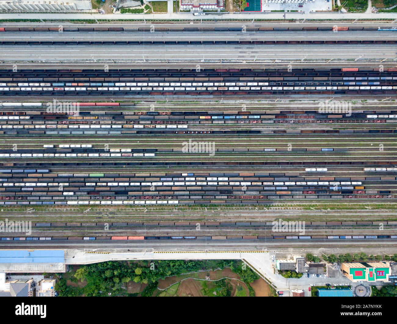An aerial view of railway trains parked at a classification yard or ...