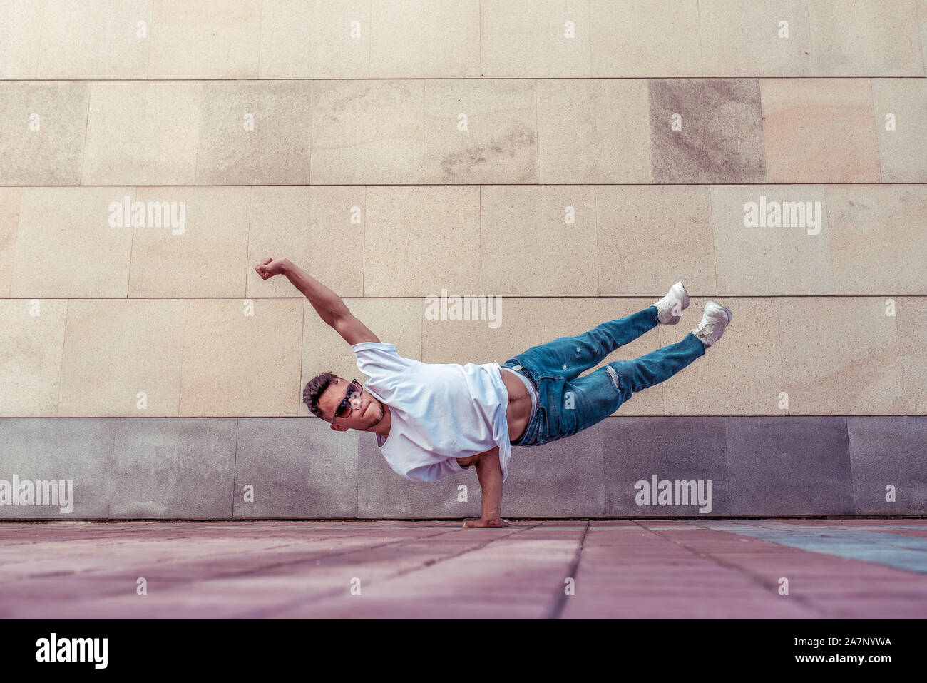 Superman flight, male acrobat dancer, handstand, dancing breakdance ...