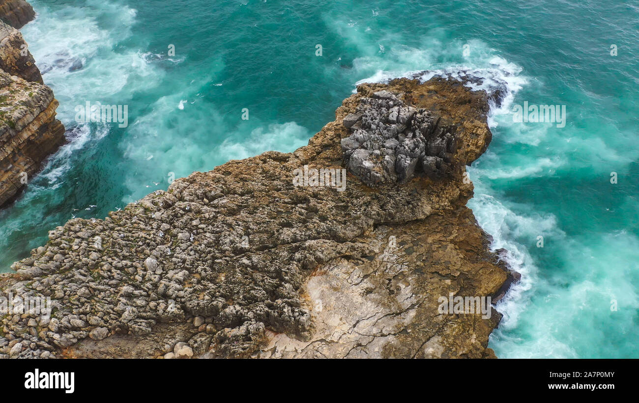 Amazing blue water of the Atlantic ocean at the Portuguese coast line ...