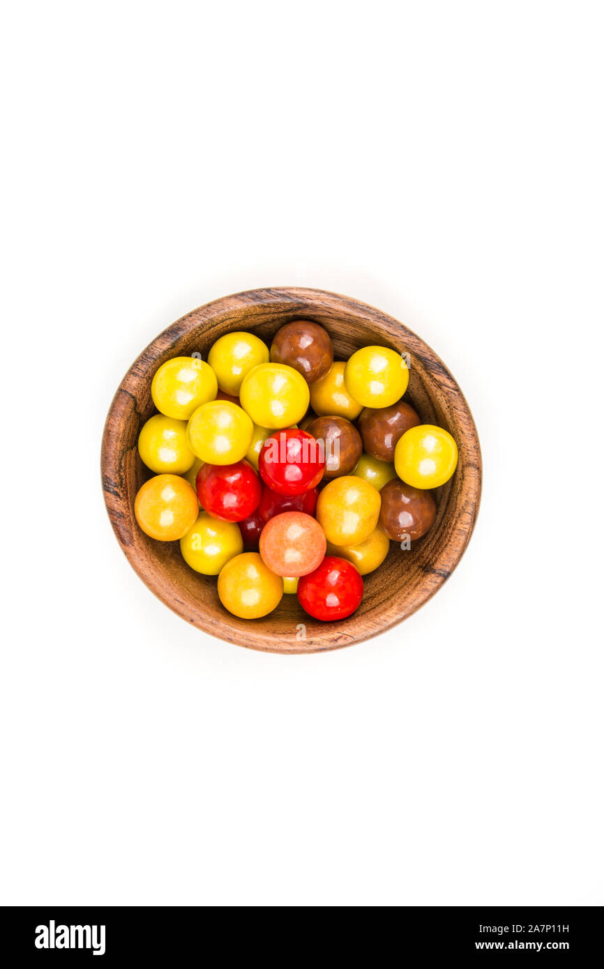 Sweet round fall colored chocolate covered candy balls Stock Photo - Alamy