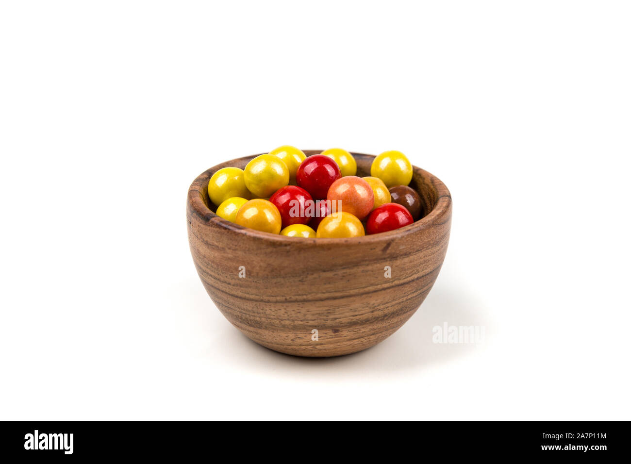 Sweet round fall colored chocolate covered candy balls Stock Photo - Alamy