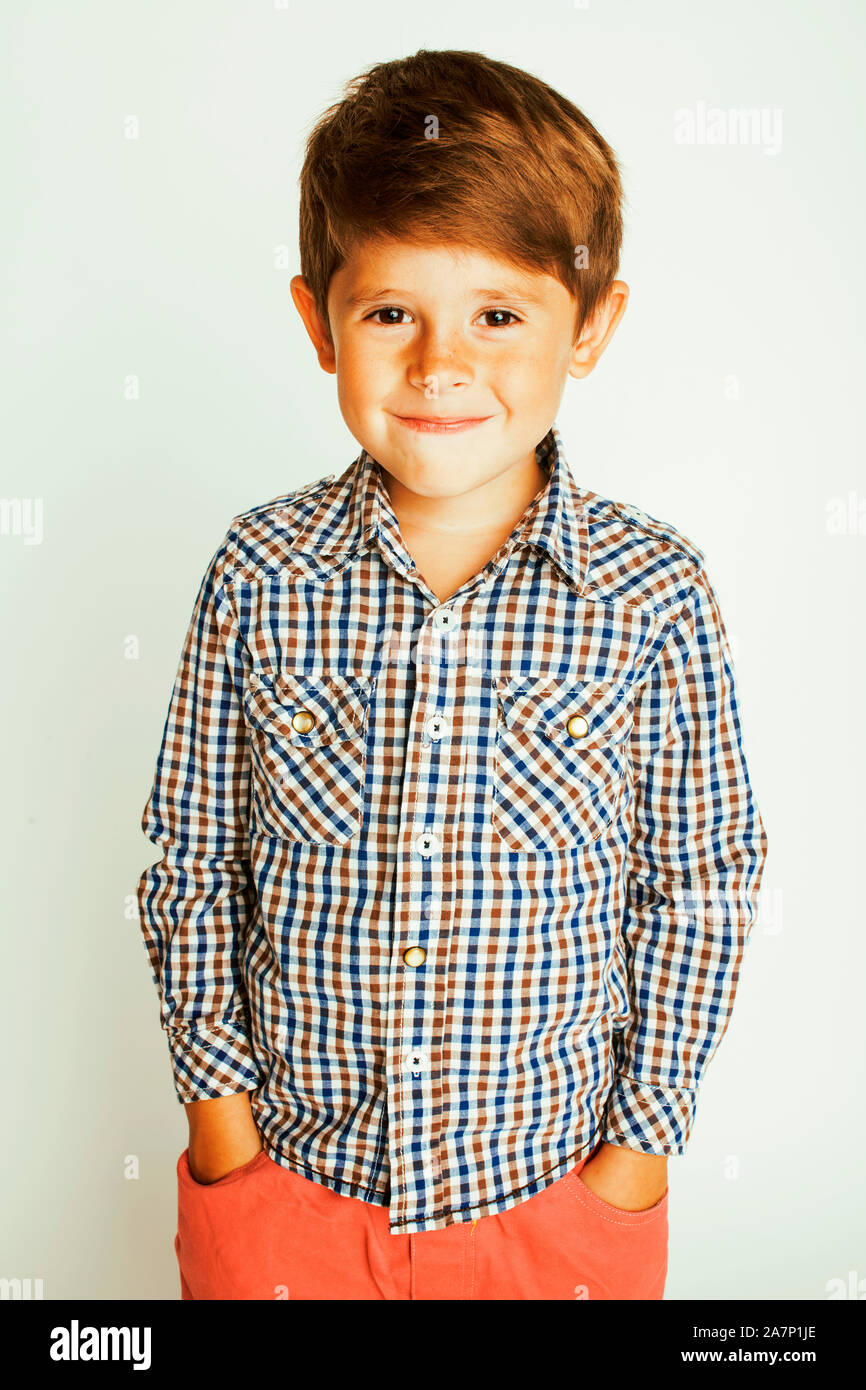 little cute real boy on white background gesture smiling close up ...