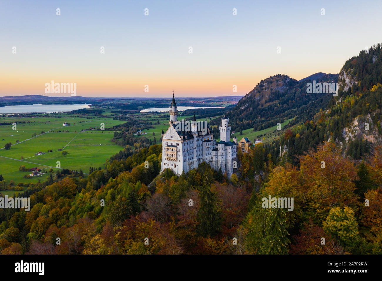 Aerial view of Neuschwanstein castle before sunset. Autumn in Germany ...