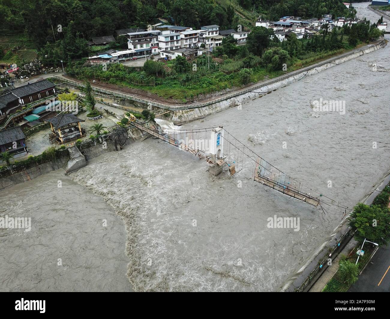 Roads, fields and residential buildings are covered with mud and ...