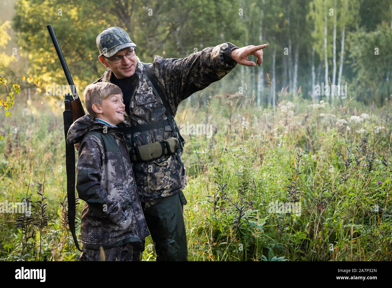 Father showing something son hi-res stock photography and images - Alamy