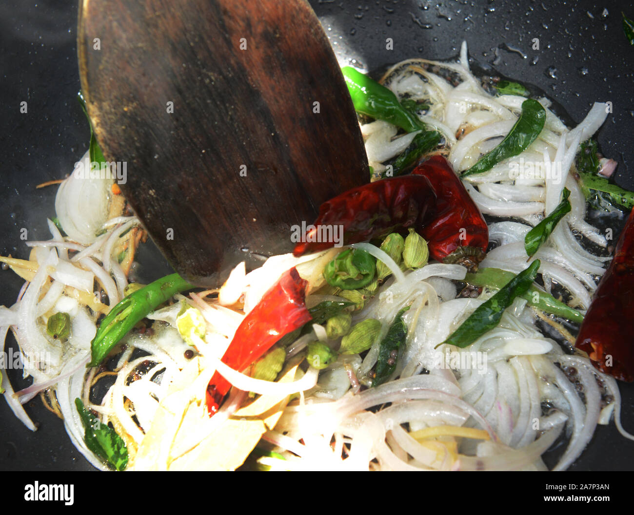 Chef at the Cardamom County resort cooking with Cardamom spice Stock ...