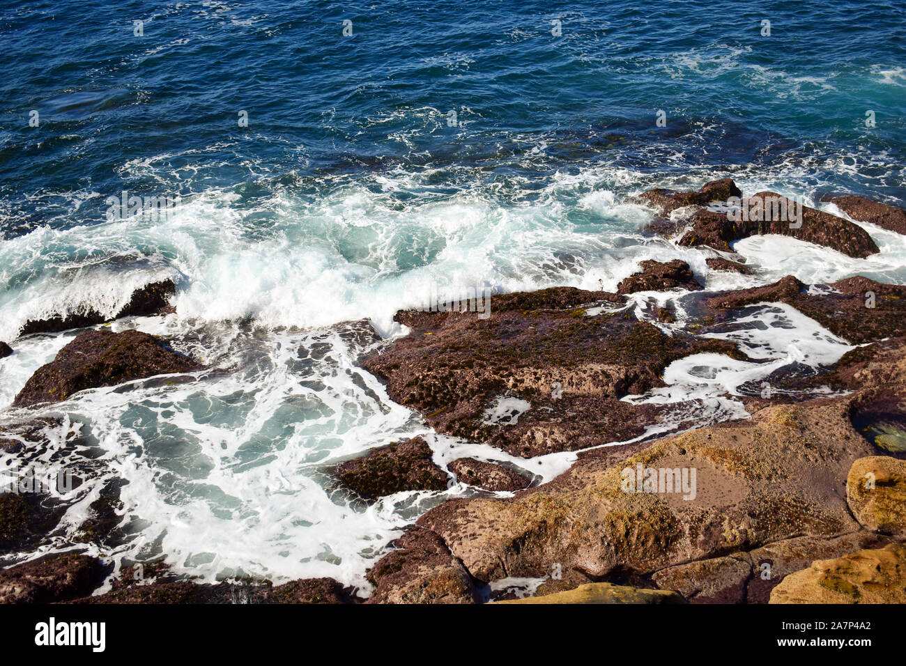 Rocks and waves Stock Photo - Alamy