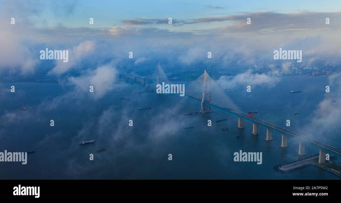 Aerial view of clouds above Shanghai-Nantong Yangtze River Bridge in ...