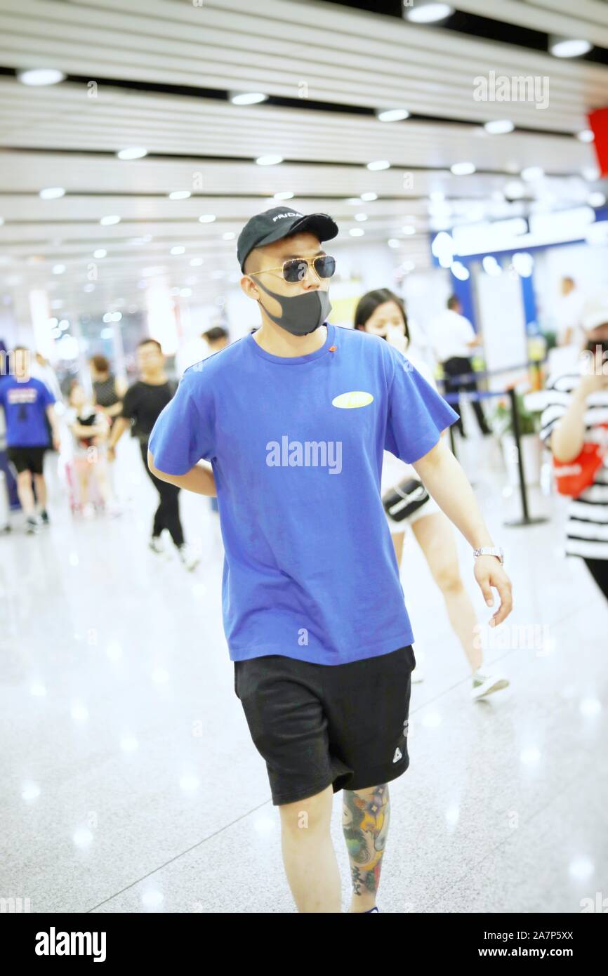 Chinese actor and singer Ohu Ou Hao arrives at the Beijing Capital ...