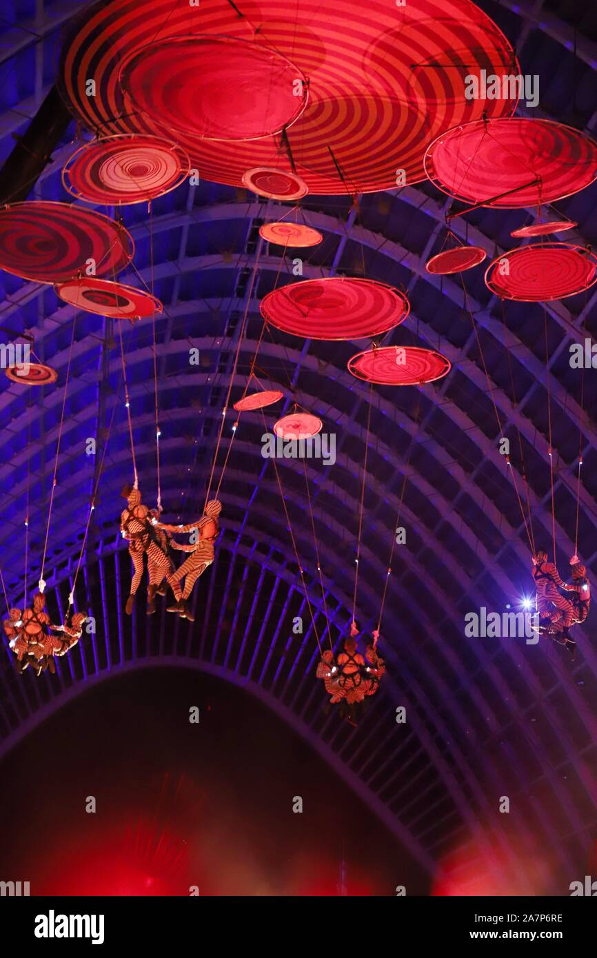 Accompanied by live rock music, aerialists of Voala, a Spanish circus ...