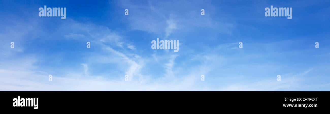 Panorama of clear blue sky with white cloud background. Clearing day ...