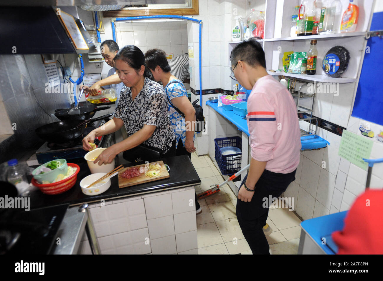 Families are cooking in the shared kitchen set up by first-year ...