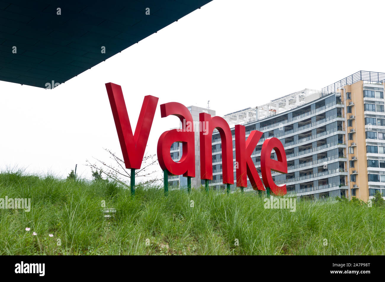 --FILE--A logo of Vanke is seen in Guangzhou city, south China's ...