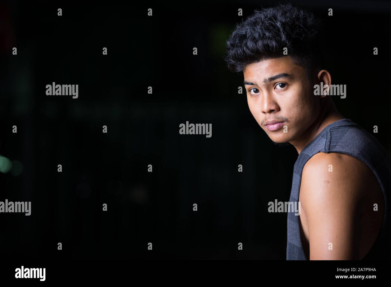 Young asian guy looking camera hi-res stock photography and images - Alamy