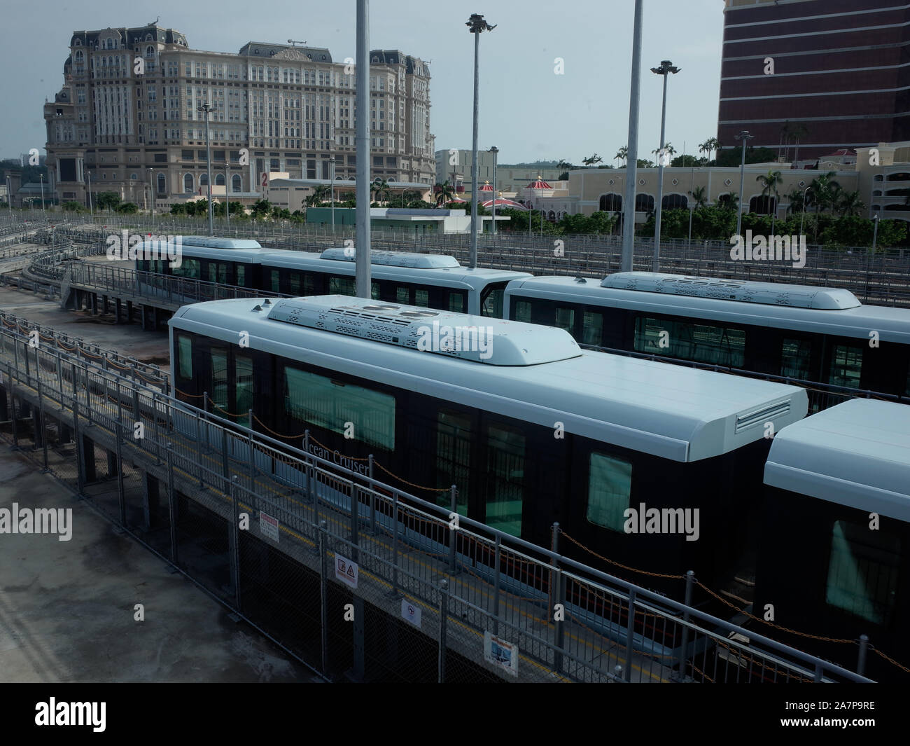 Chinese workers introduce the Light Rail Transit (LRT) system at the ...