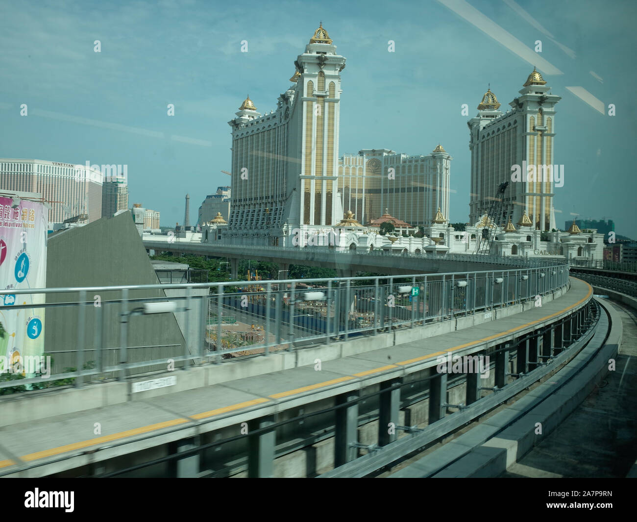 Chinese workers introduce the Light Rail Transit (LRT) system at the ...