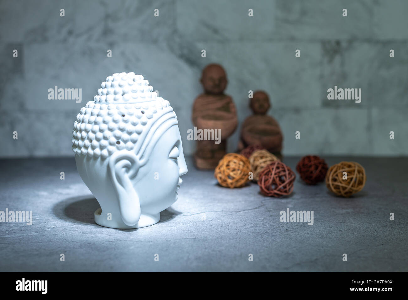 Home decoration ornament. White buddha head face, rattan cane balls ...