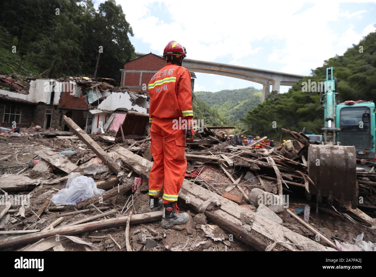 Rescuers conduct rescue operation in landslide area caused by Typhoon ...