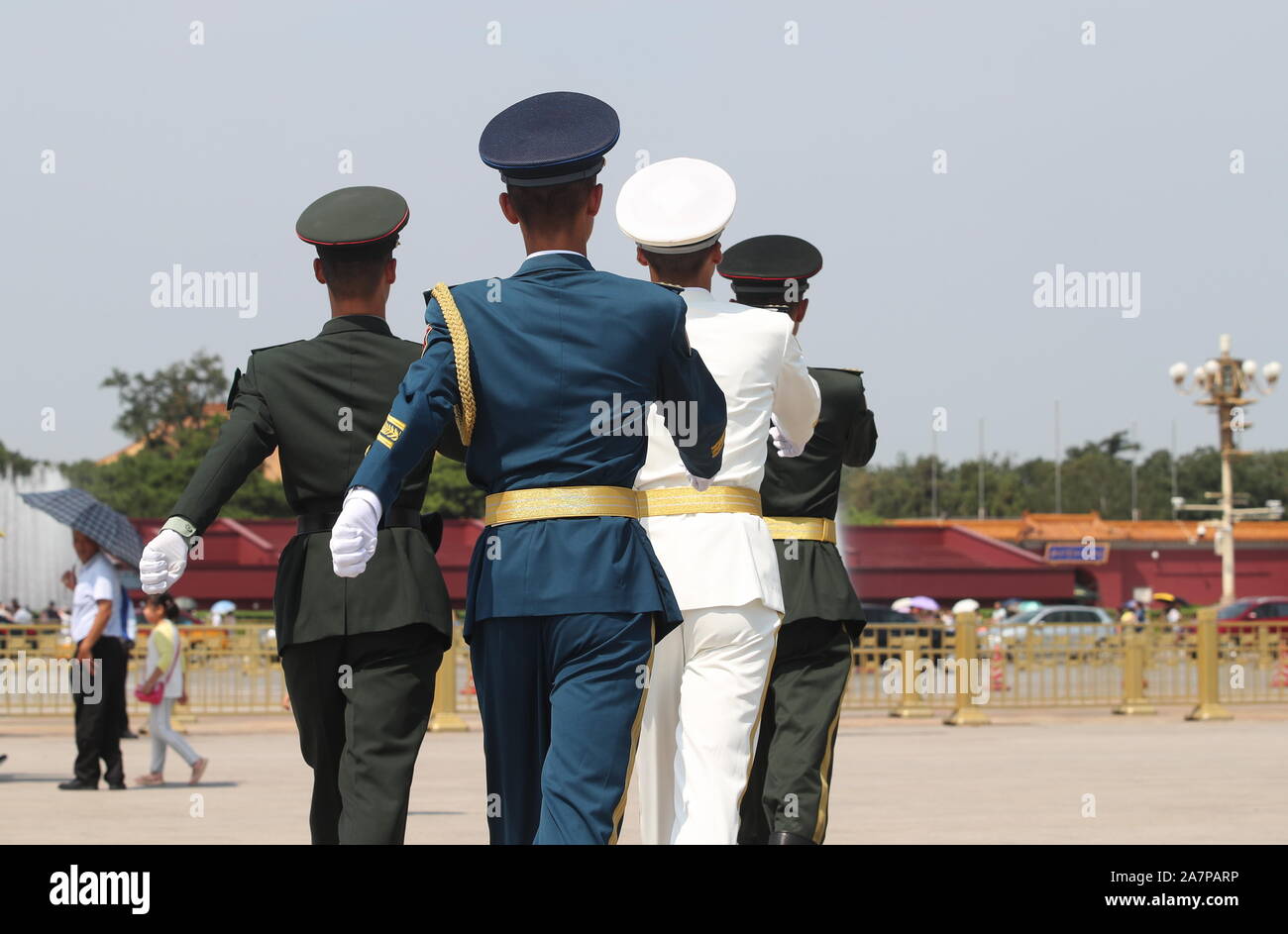 Two soldiers, a sailor and an airman patrol at the Tian'anmen Square to ...
