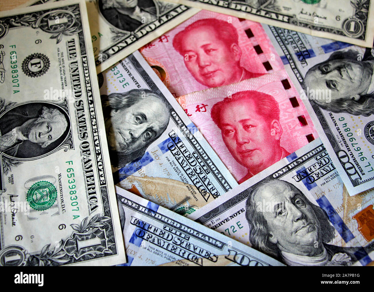--FILE--In this undated and unlocated photo, renminbi and dollars are ...